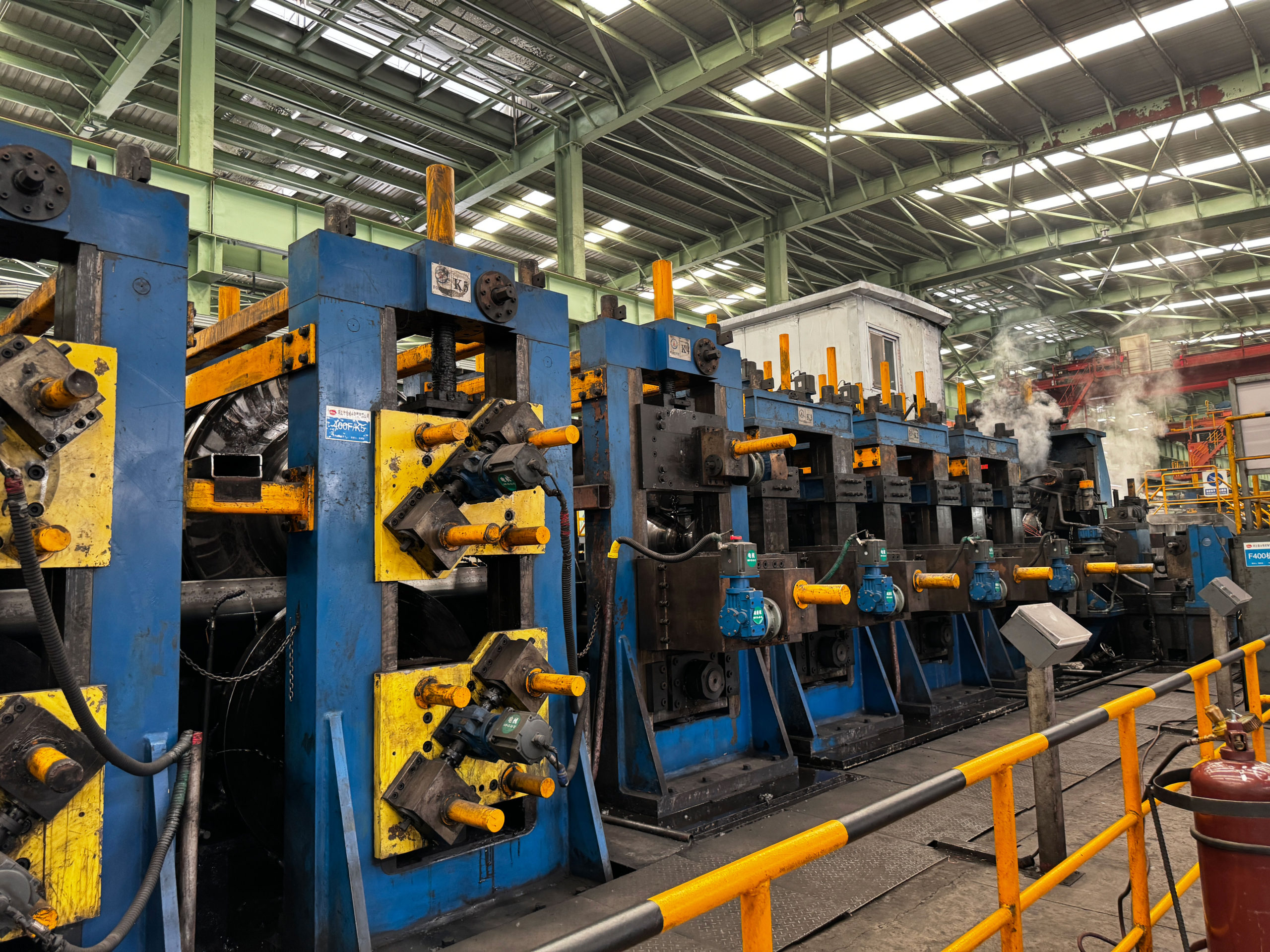 TUBE MILL SIZING AND STRAIGHTENING SECTIONS